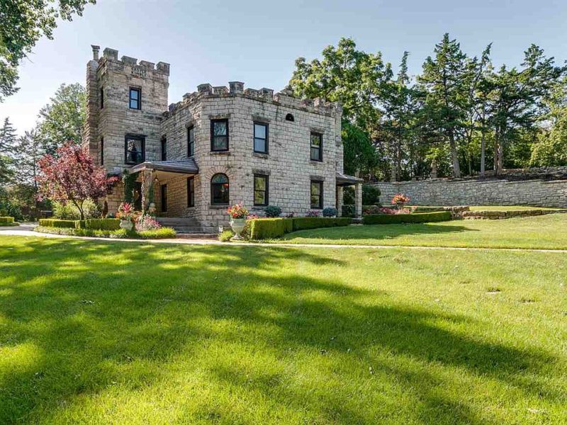 A castle in Kansas! Circa 1894. Over one acre with two guest houses ...