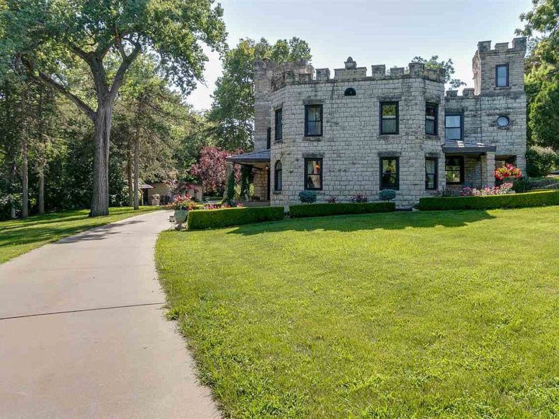 A castle in Kansas! Circa 1894. Over one acre with two guest houses ...