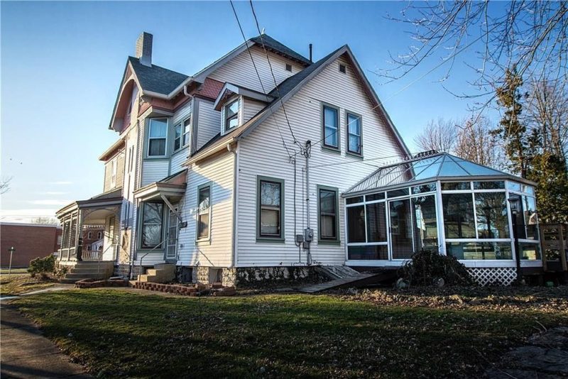 Beautiful windows! Circa 1900 in Indiana. $159,900 – The Old House Life