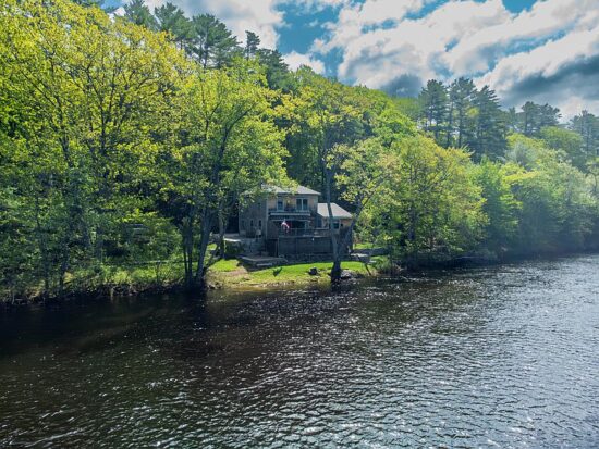 Sold. Love the library! The house over the water. Circa 1835 in Maine. $350,000 – The Old House Life
