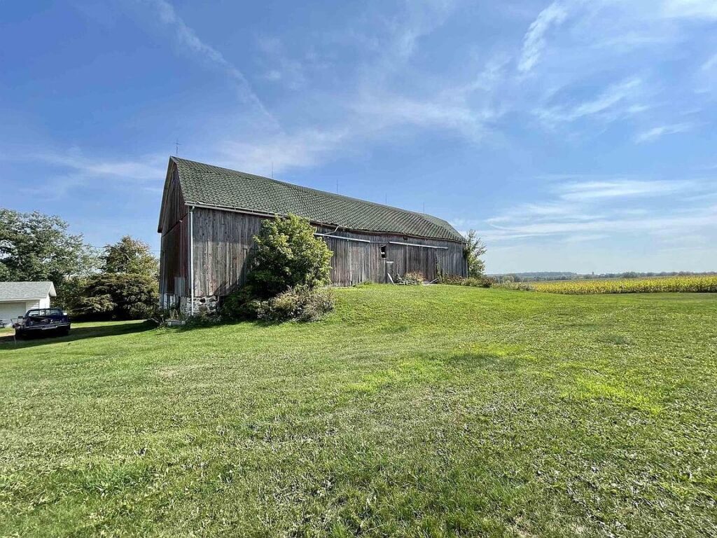 Love the setting for this one! Circa 1903. On 13 acres in Wisconsin ...