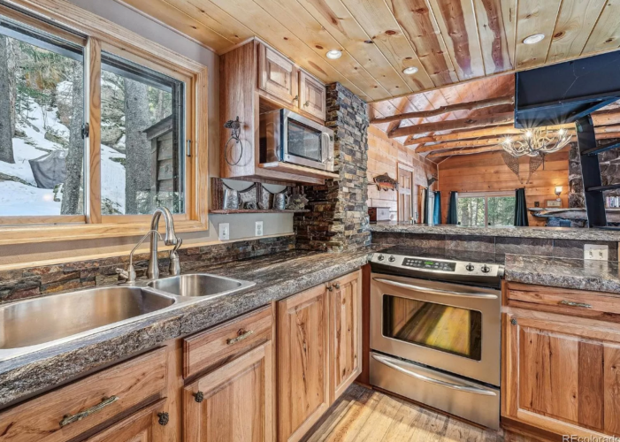 Pretty stonework on this Colorado cabin! Circa 1950. One acre. $300,000 ...